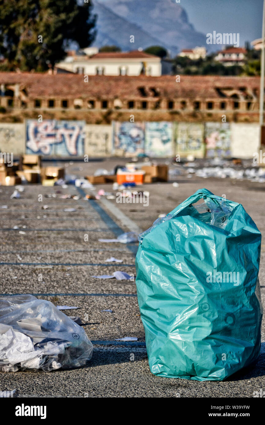 Plastic trash and other garbage on square, Italy Stock Photo - Alamy