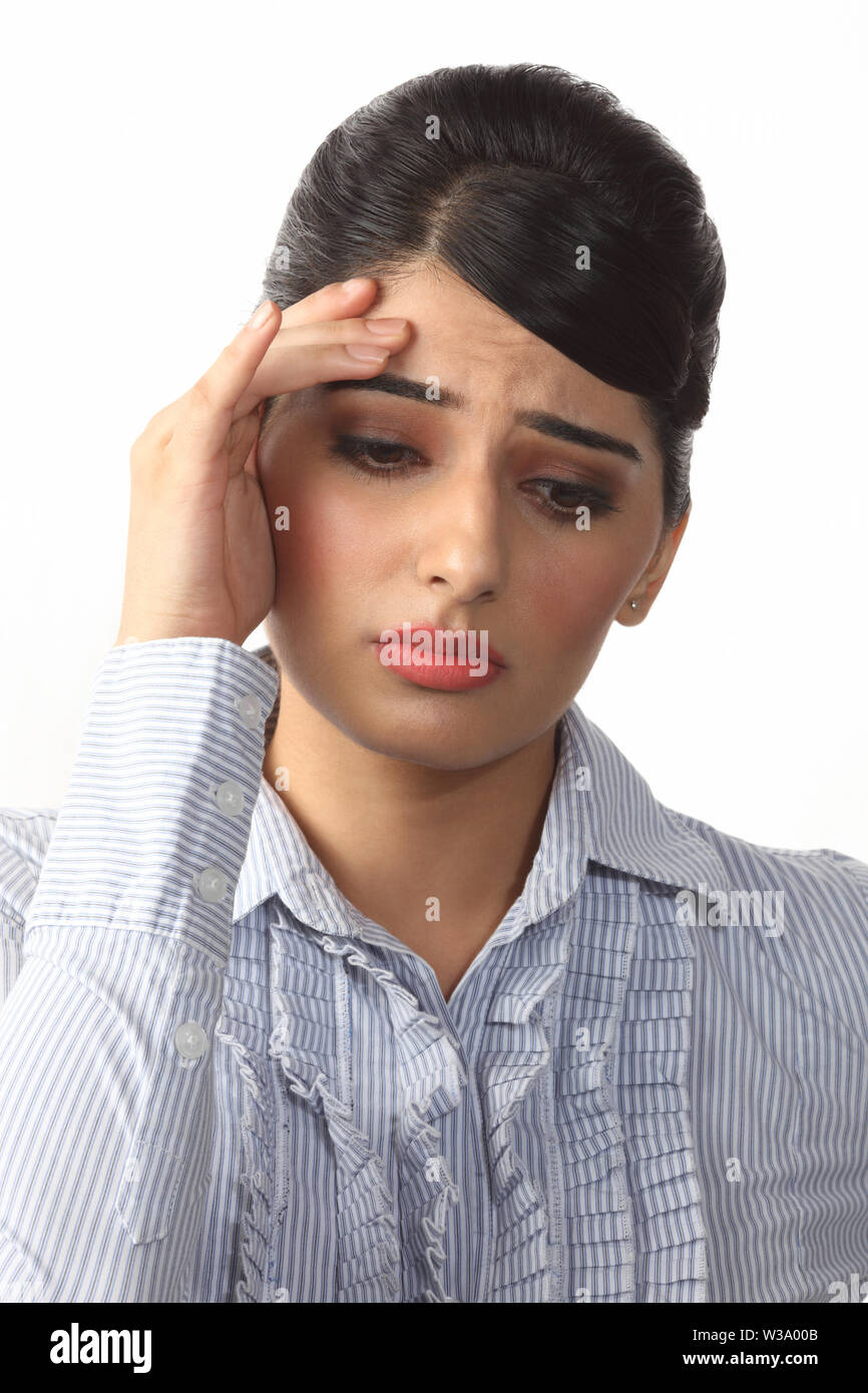 Indian businesswoman looking stressed Stock Photo - Alamy