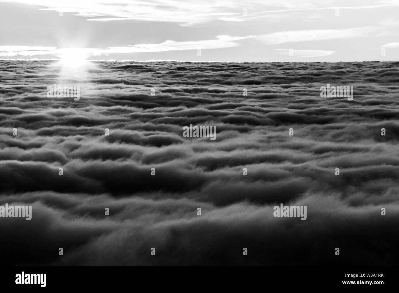Sunset into the sea Black and White Stock Photos & Images - Alamy