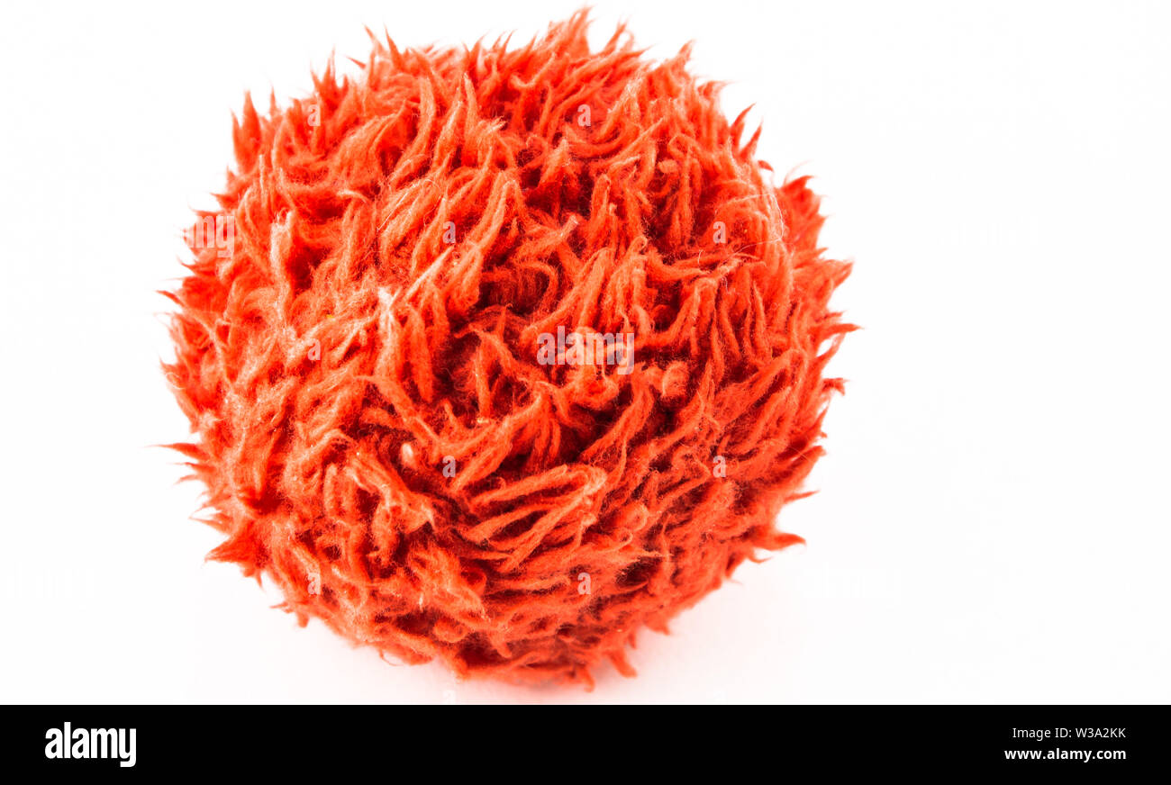 Red fluffy ball isolated on white background Stock Photo - Alamy