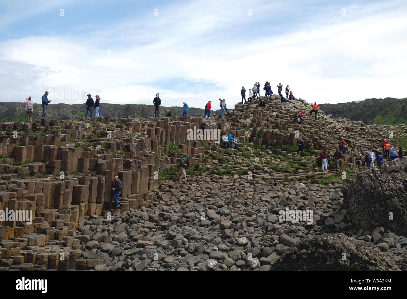 Visitors on the Top of Black Hexagonal Interlocking Basalt Columns on ...