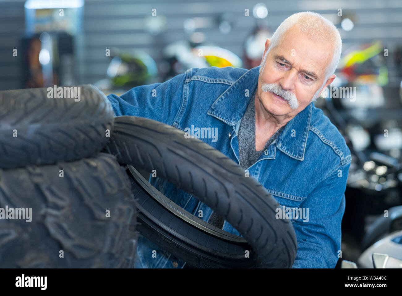 Senior man looking motorcycle hi-res stock photography and images - Alamy