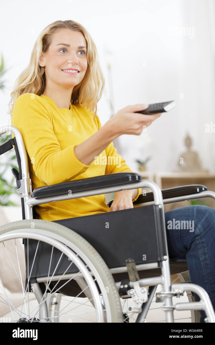 Old woman watching tv wheelchair hi-res stock photography and images ...