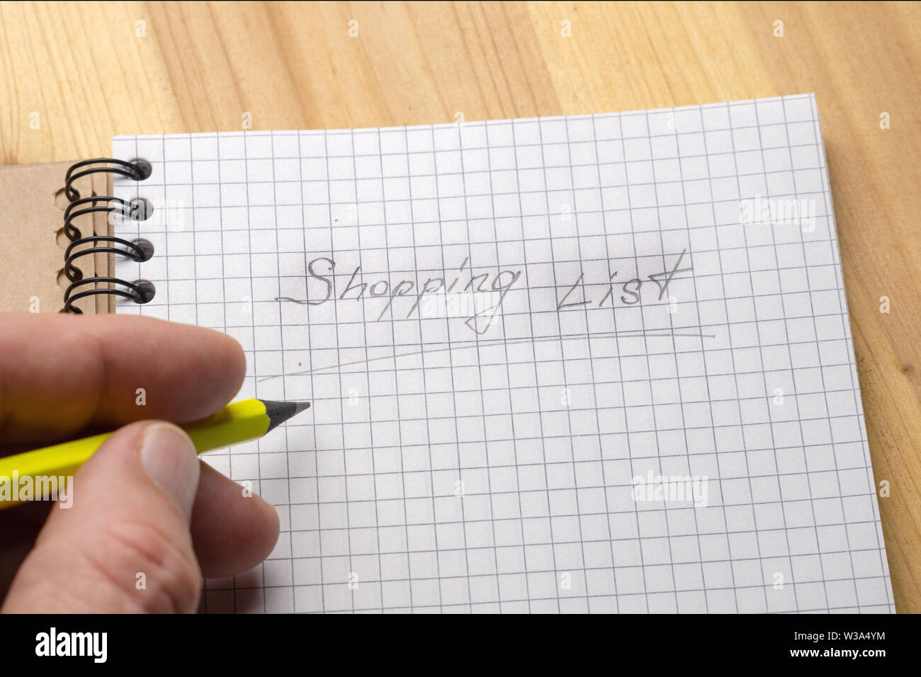 Top view man writes word hi-res stock photography and images - Alamy