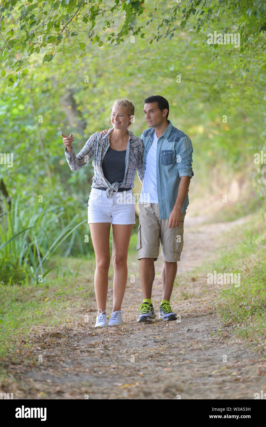 Attractive couple walking woods hi-res stock photography and images - Alamy
