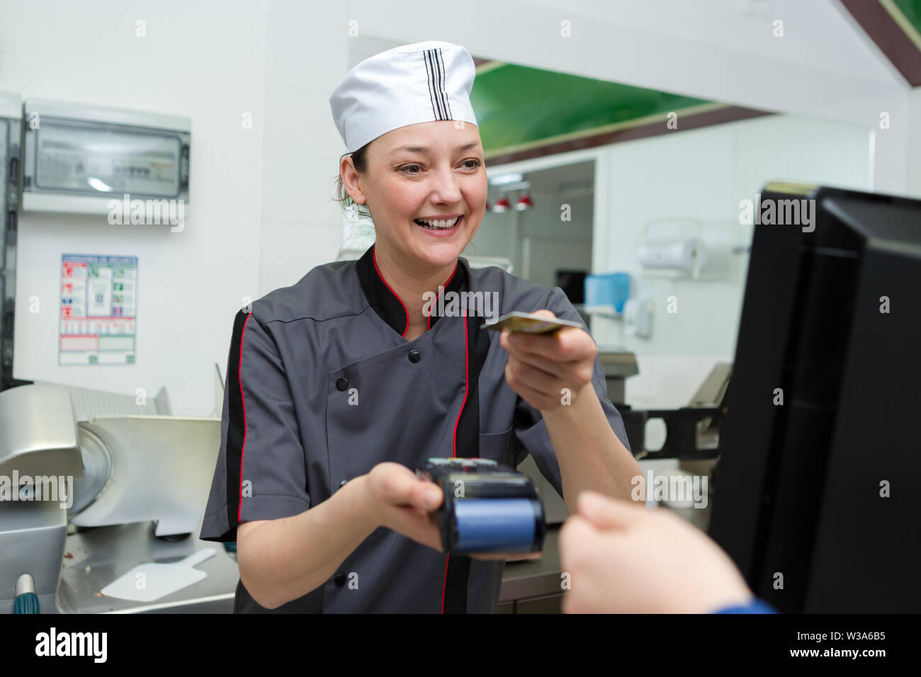 Butcher store payment hi-res stock photography and images - Alamy