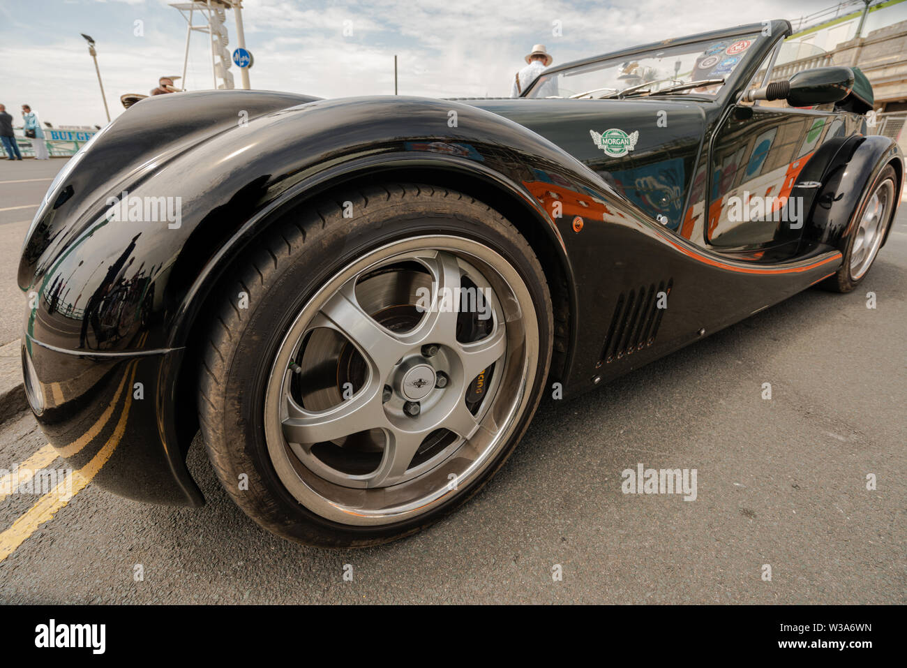 Curvy black car Stock Photo - Alamy