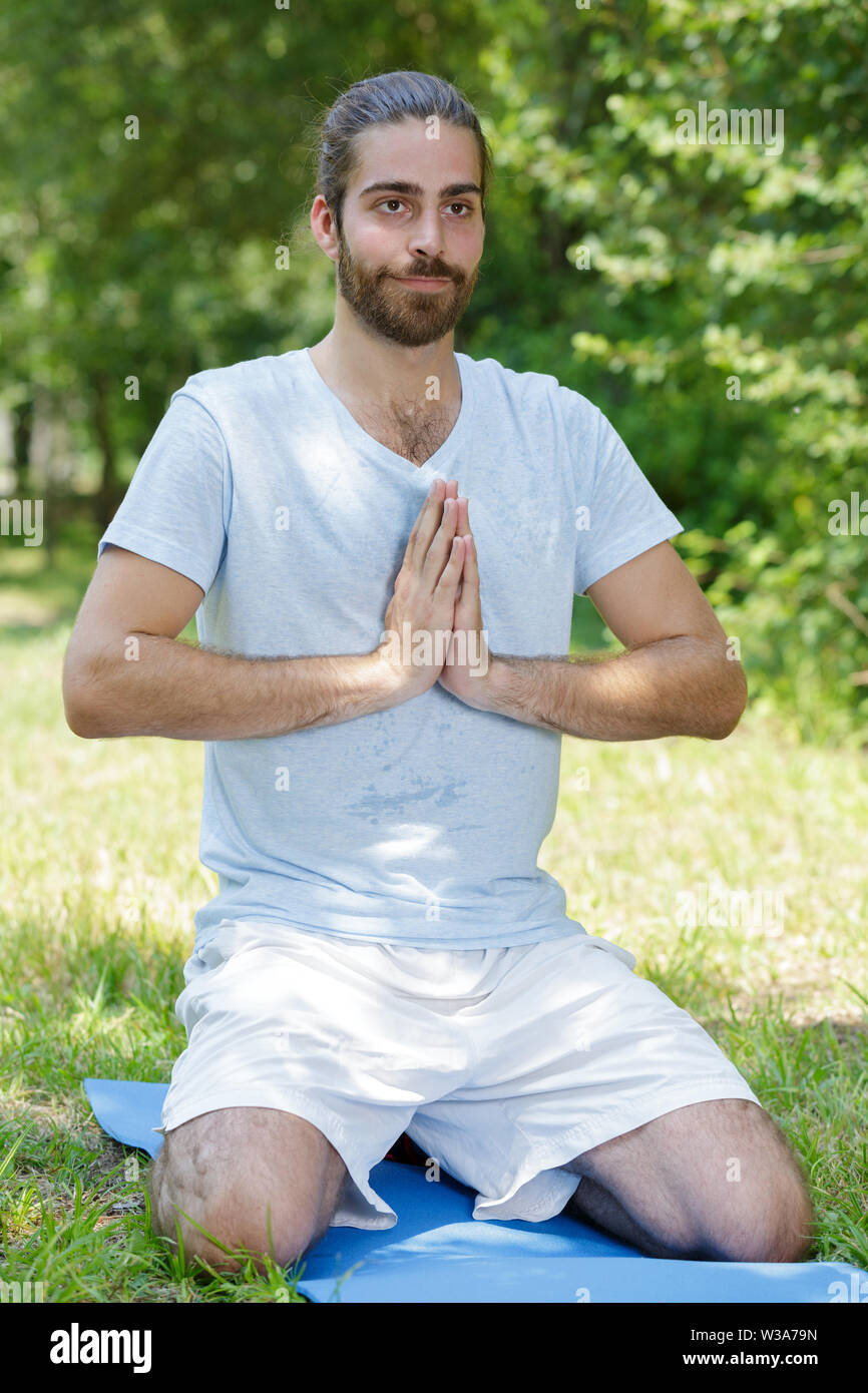 Beginner male yoga hi-res stock photography and images - Alamy