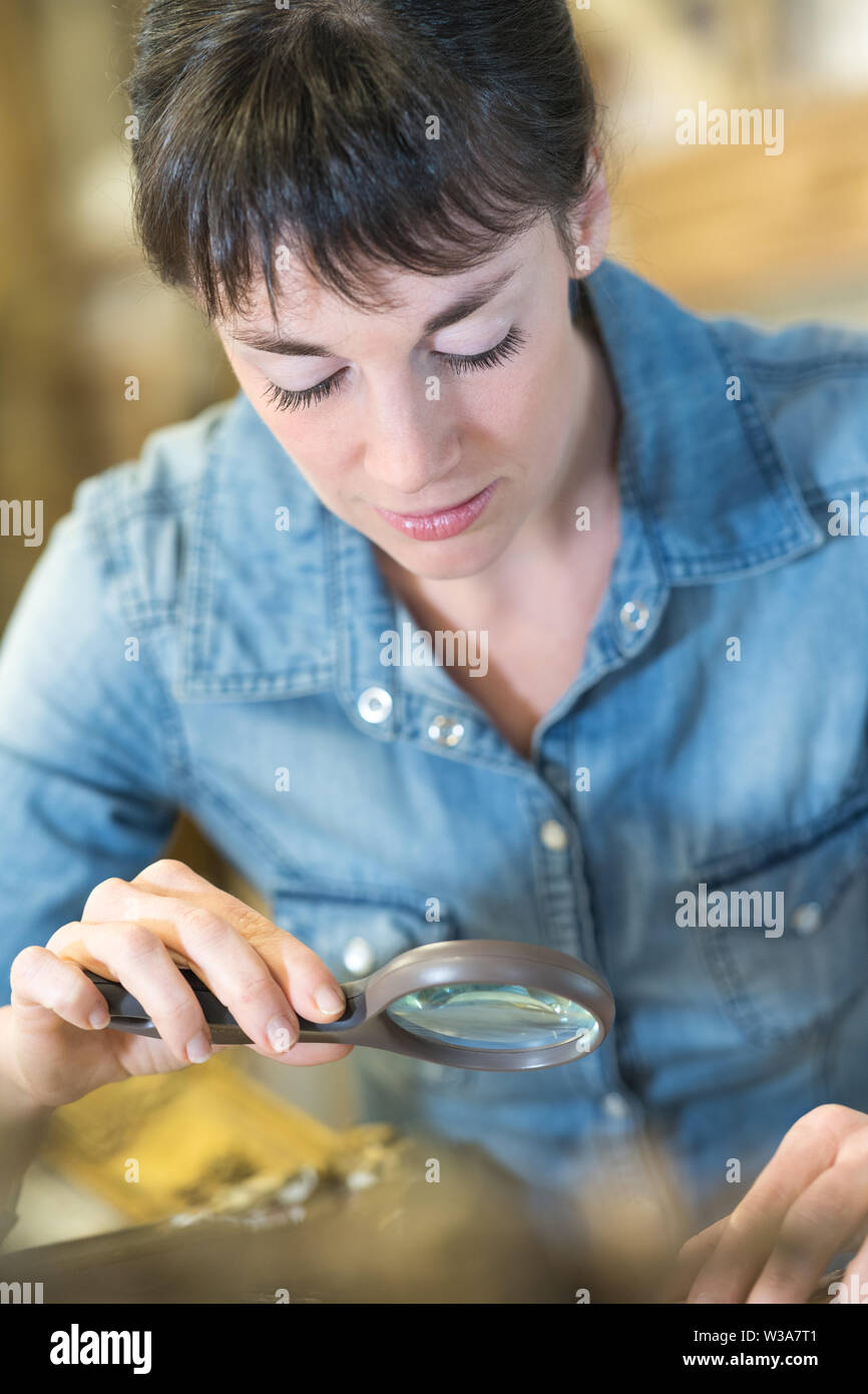 Model woman magnifying glass hi-res stock photography and images - Alamy
