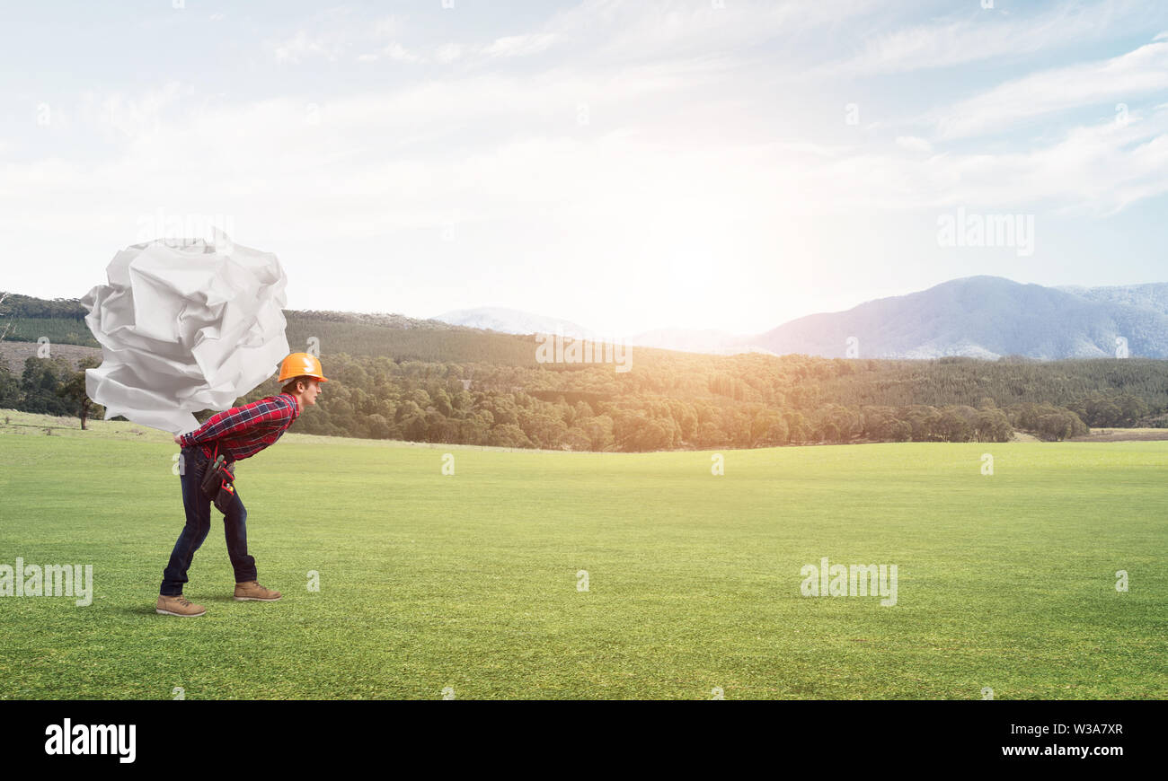 Engineer man carry load Stock Photo - Alamy