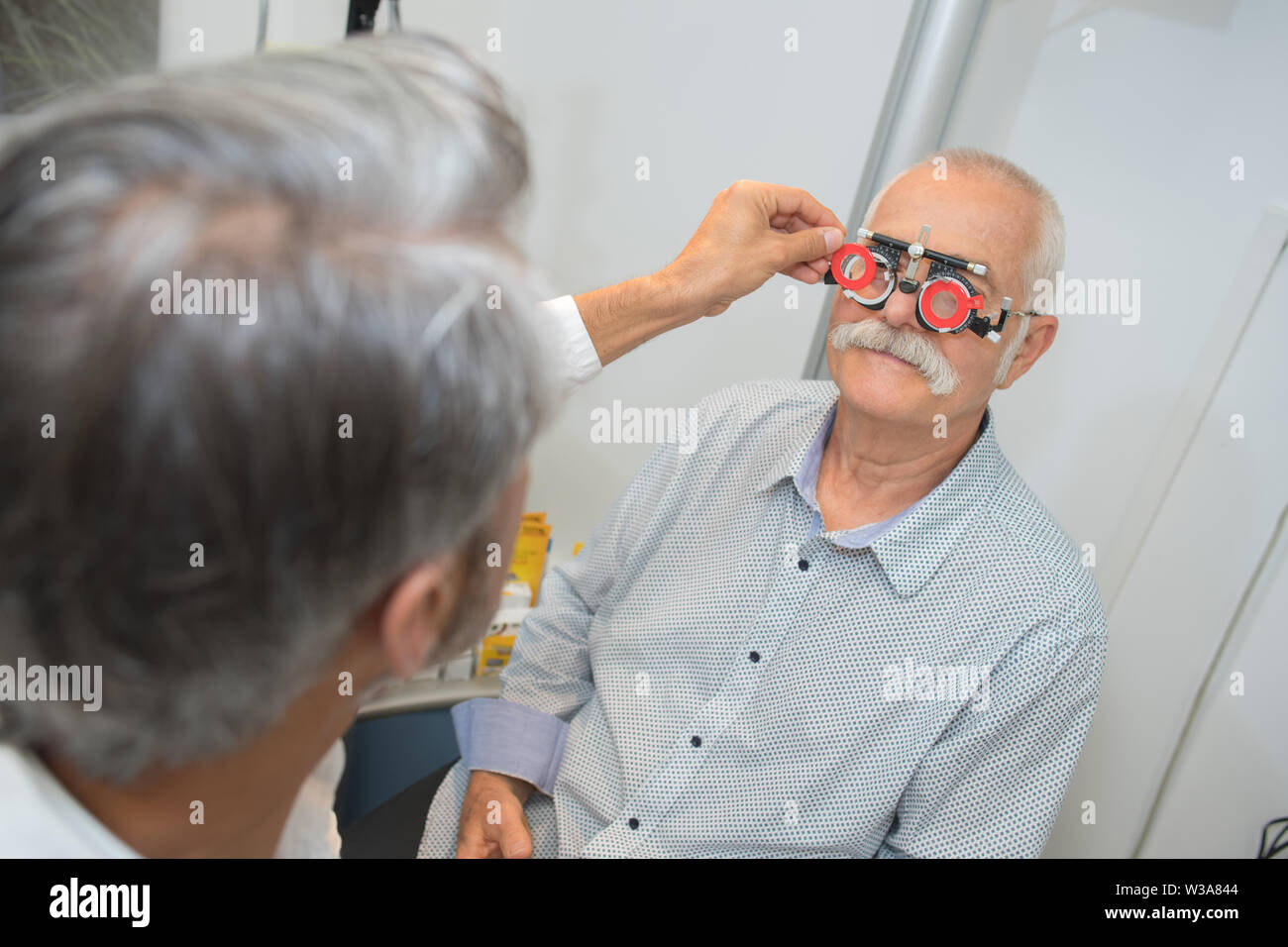Having eyes tested hi-res stock photography and images - Alamy