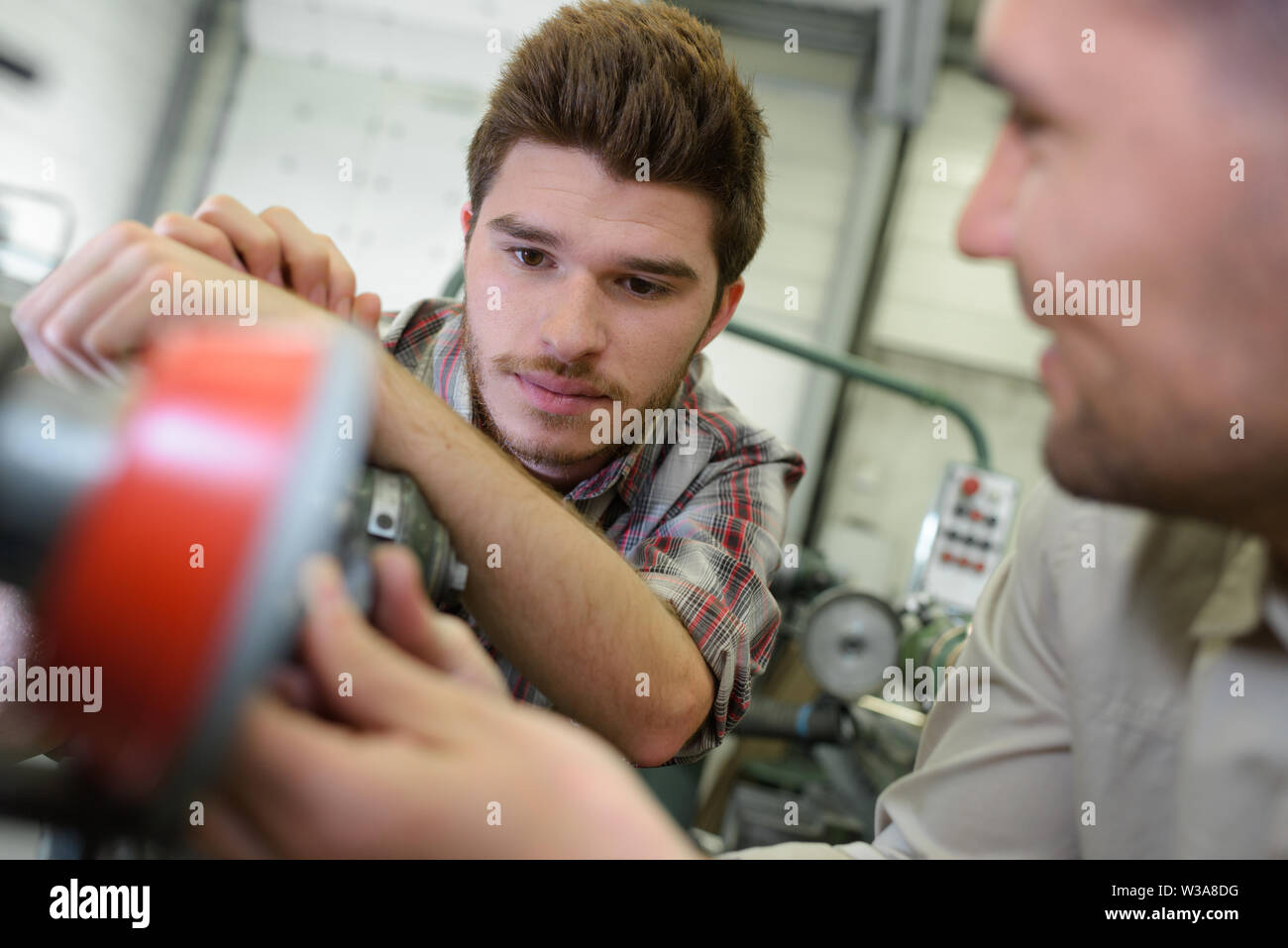 man working in steel factory Stock Photo - Alamy
