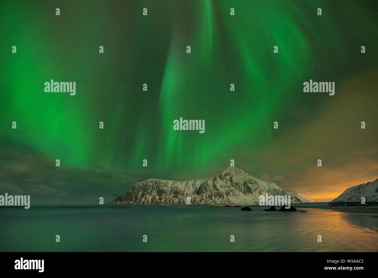 Aurora Borealis on the Lofoten Islands, Norway. Green northern lights ...