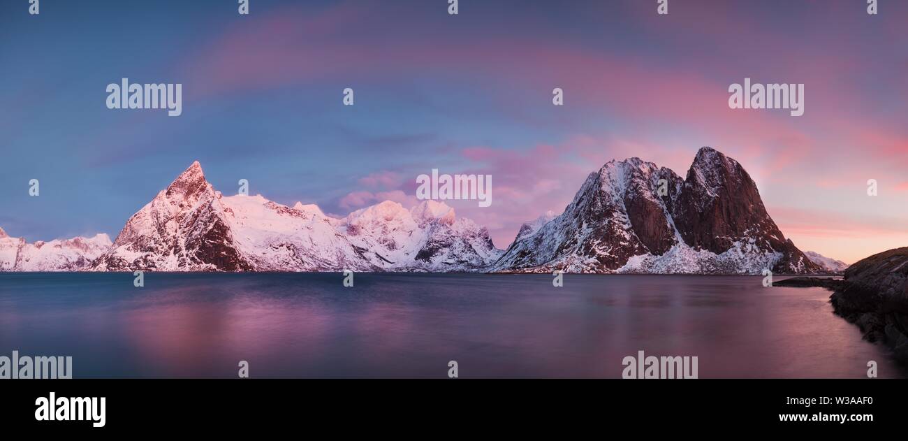 Scenic fjord on Lofoten islands, Reine, Norway. First snow in mountains ...