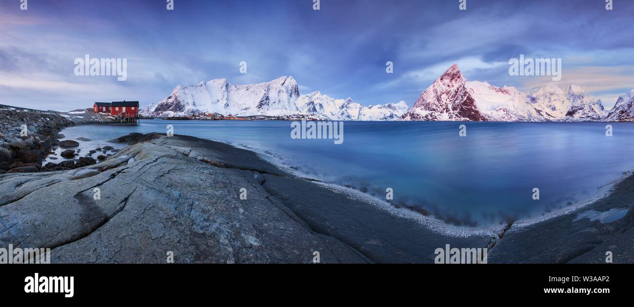 Scenic fjord on Lofoten islands, Reine, Norway. First snow in mountains ...