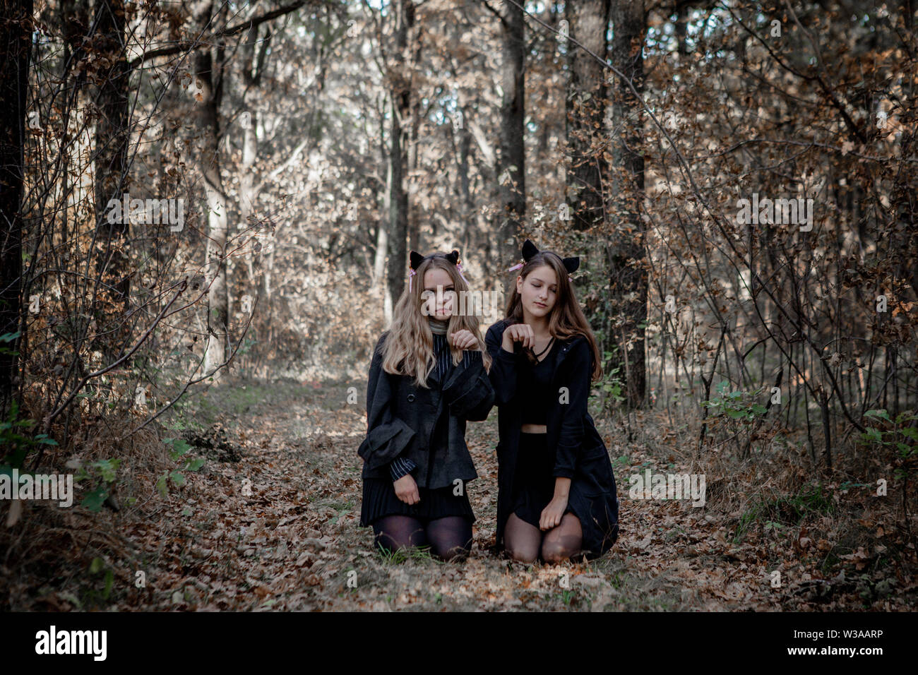 Halloween Maniac and Witch in the Forest. Teenagers in Halloween ...