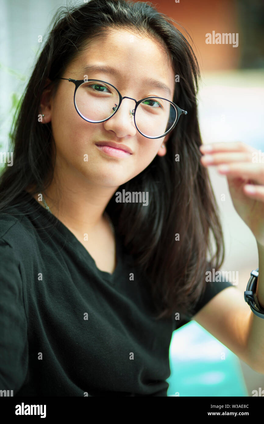 headshot of asian teenager toothy smiling face with happiness emotion ...