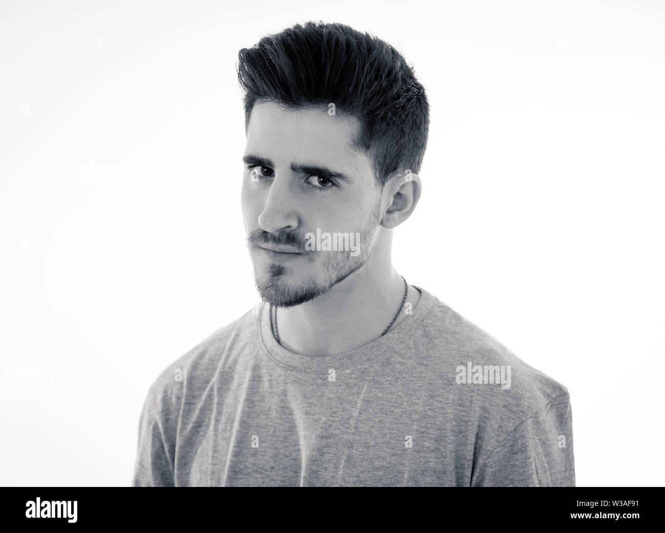 Close up portrait of young man with angry face feeling anger and ...