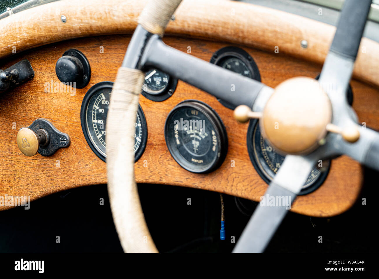 Cockpit of a vintage car showing the ignition timing levers on the ...