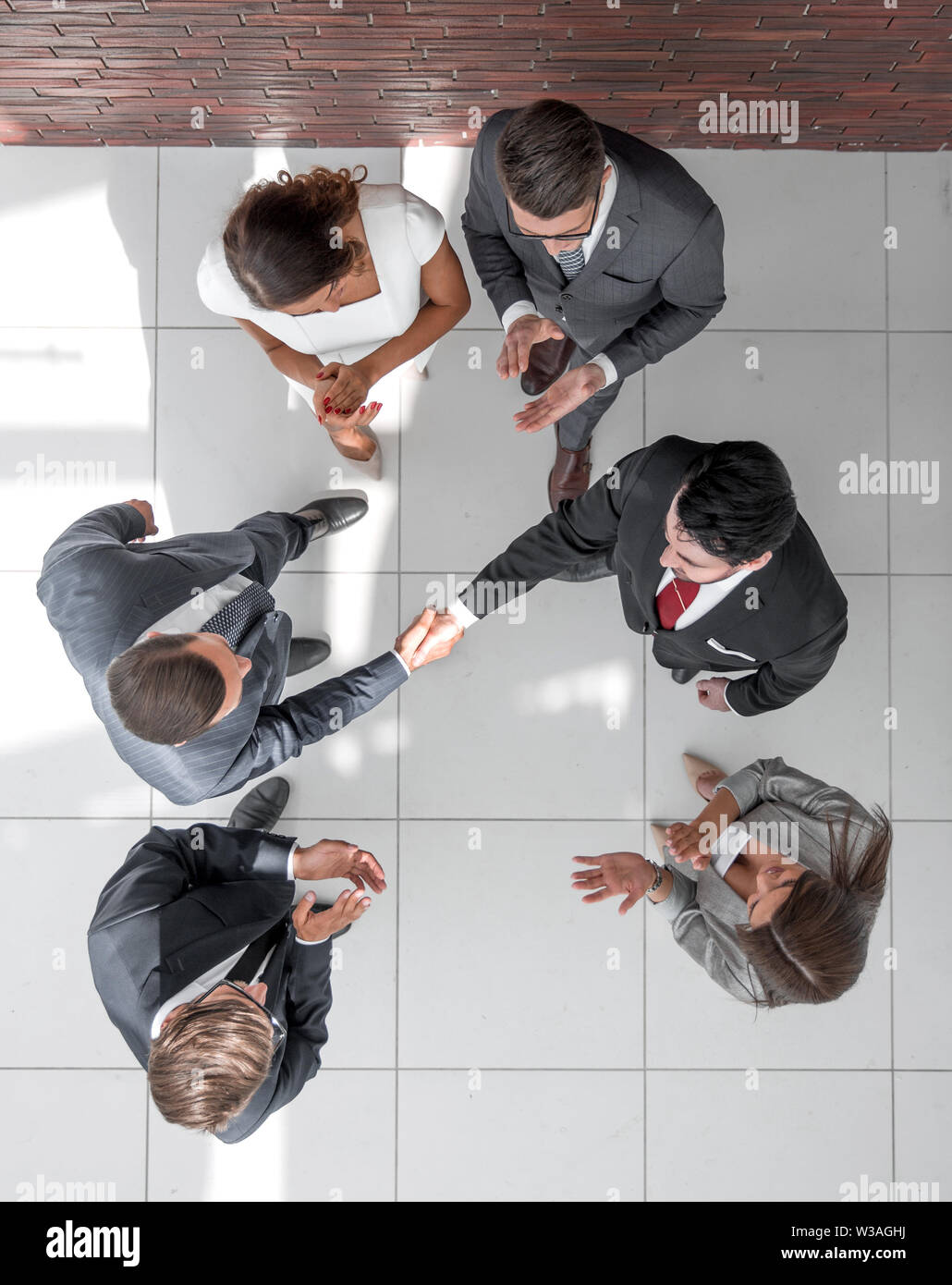 top view.meeting business partners and handshake Stock Photo - Alamy