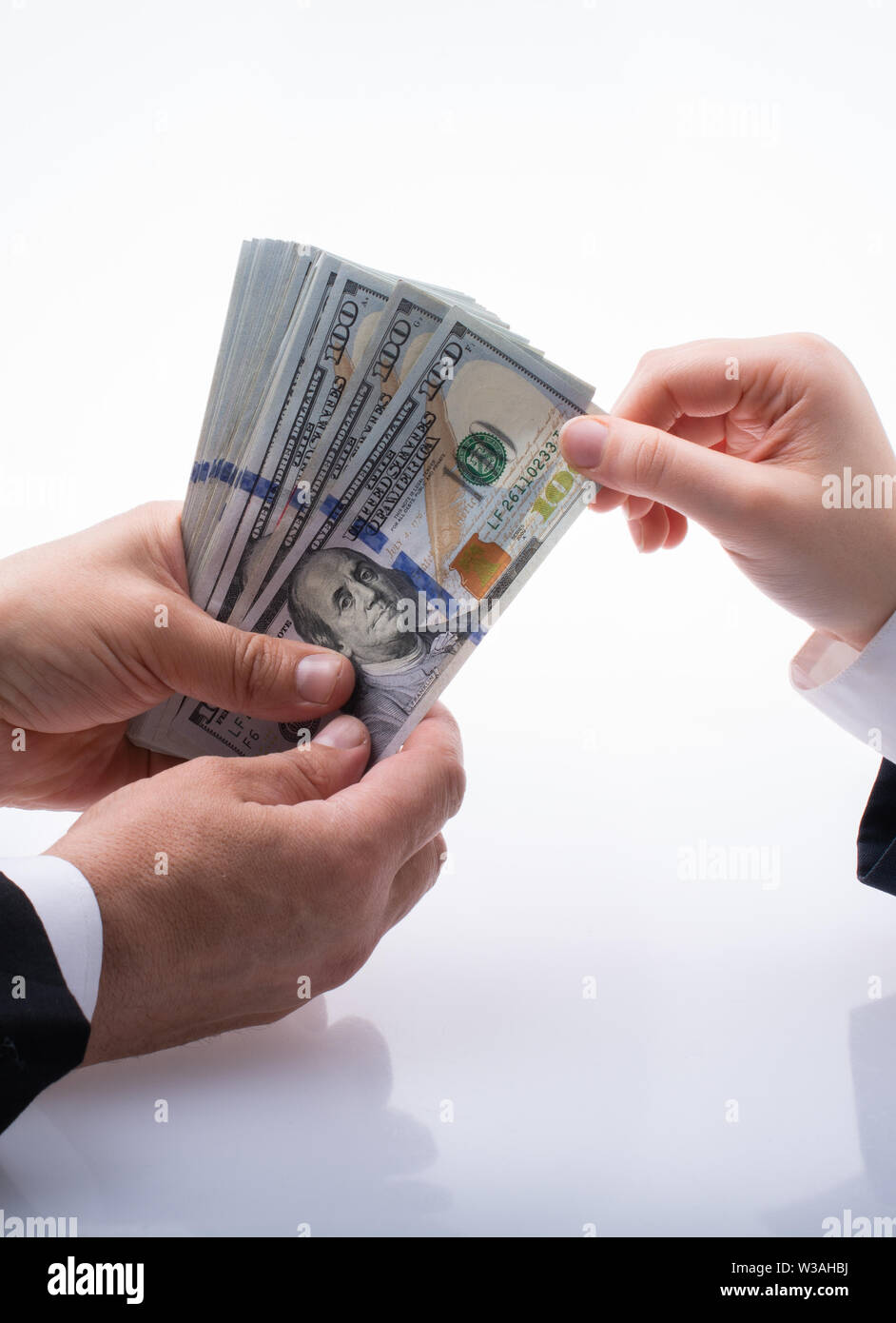 Businessman giving and receiving US dollar banknote money Stock Photo ...