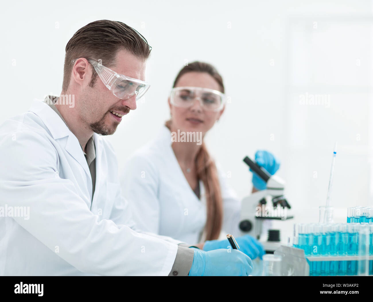 Two scientists biologists sitting hi-res stock photography and images ...