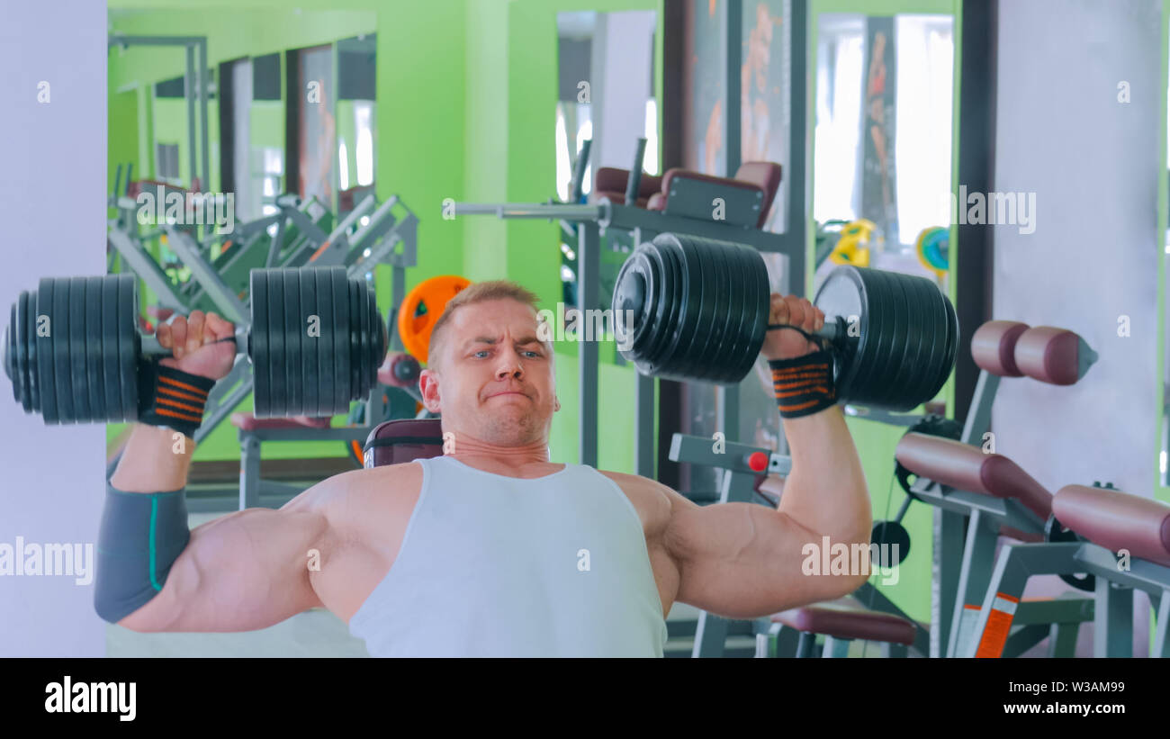 Athletic young man lifting hi-res stock photography and images - Alamy