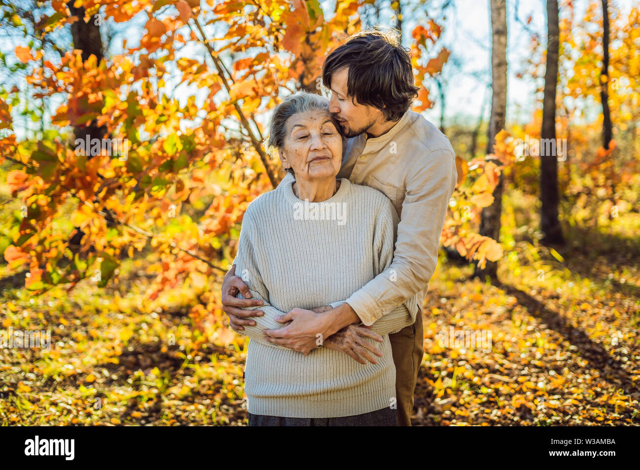 Grandson hugging beautiful senior hi-res stock photography and images ...