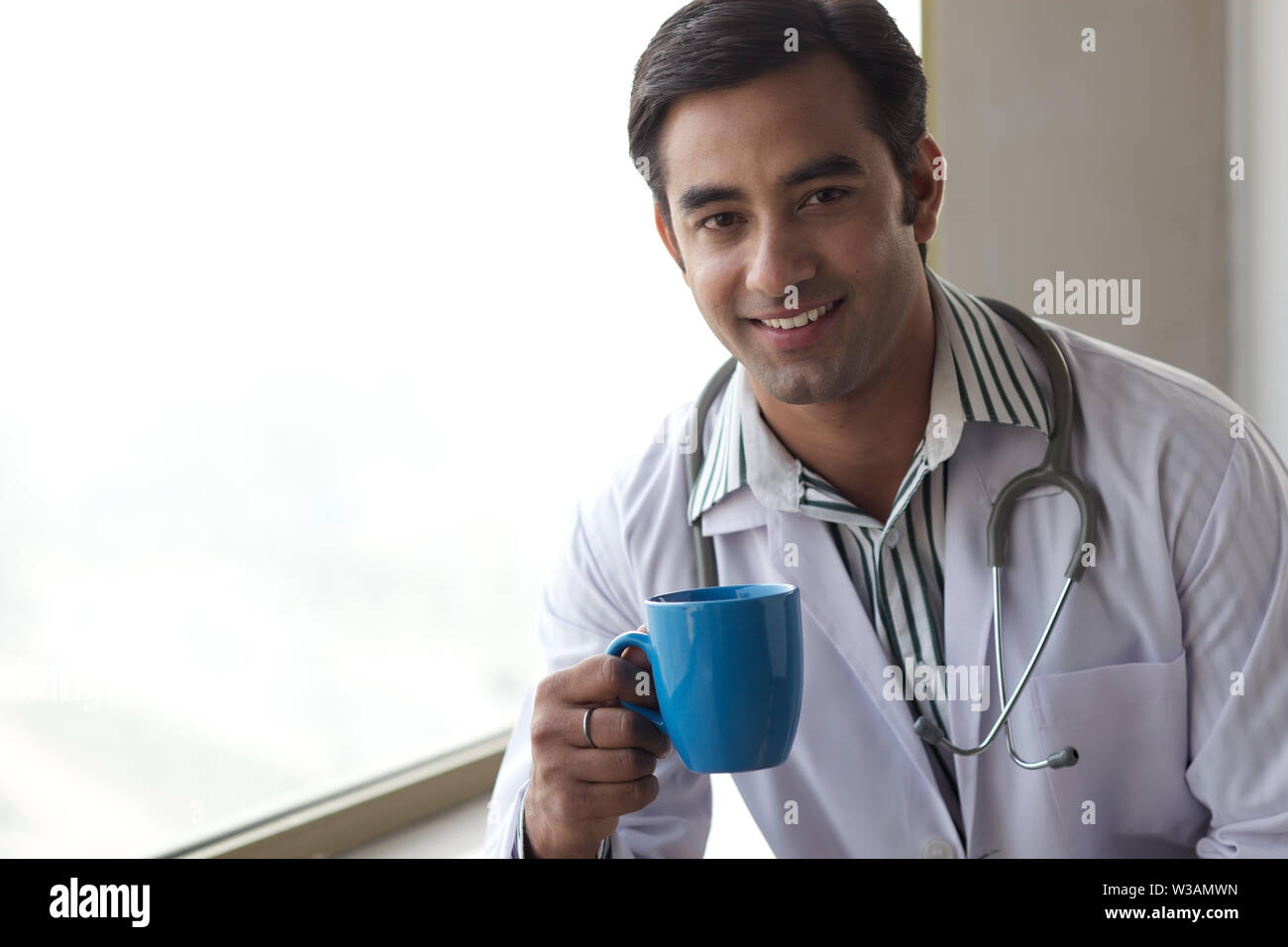 Happy doctors coffee hi-res stock photography and images - Alamy