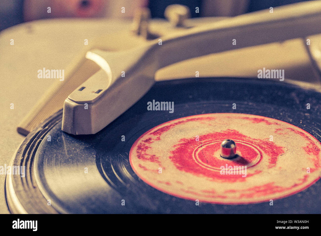 Old record player and old scratched vinyl records Stock Photo - Alamy