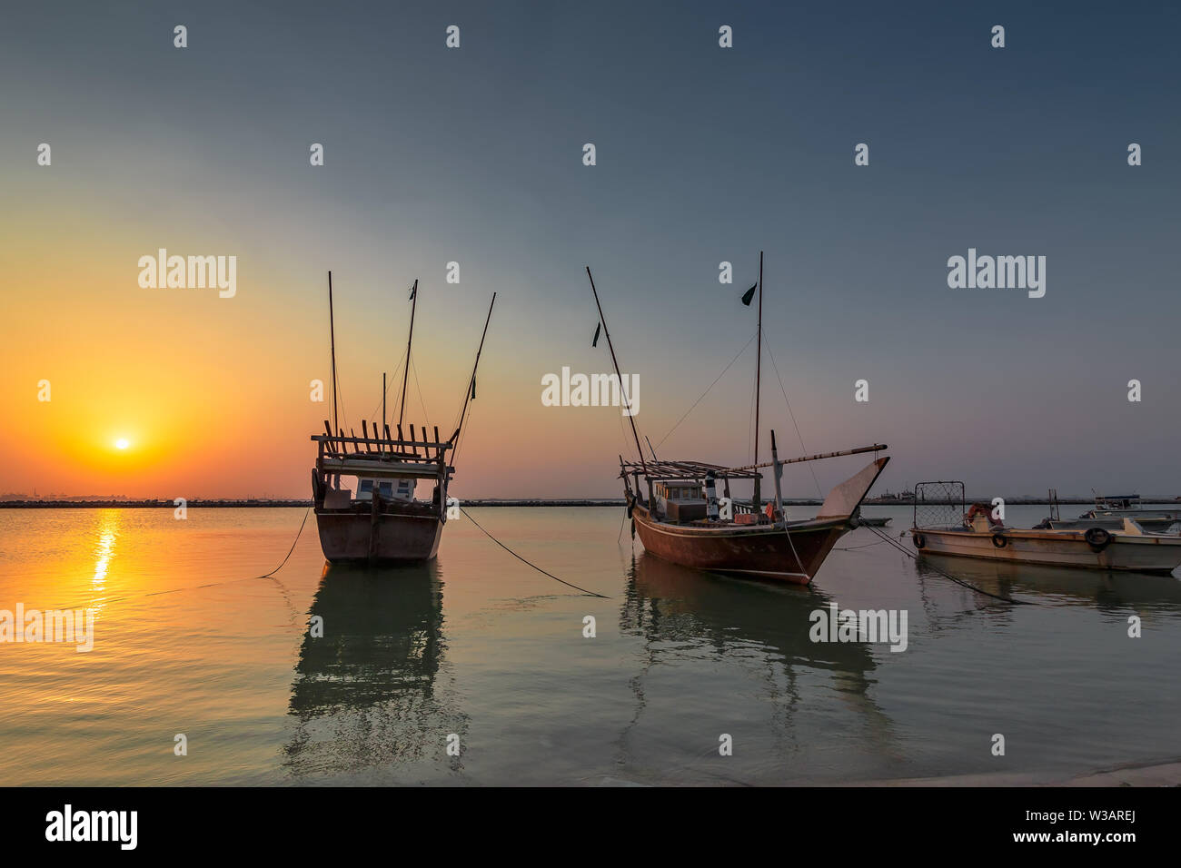 Beautiful Sunrise Boat in seaside with yellow and blue sky background ...