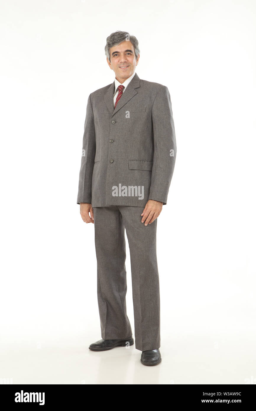 Portrait of a businessman standing Stock Photo - Alamy