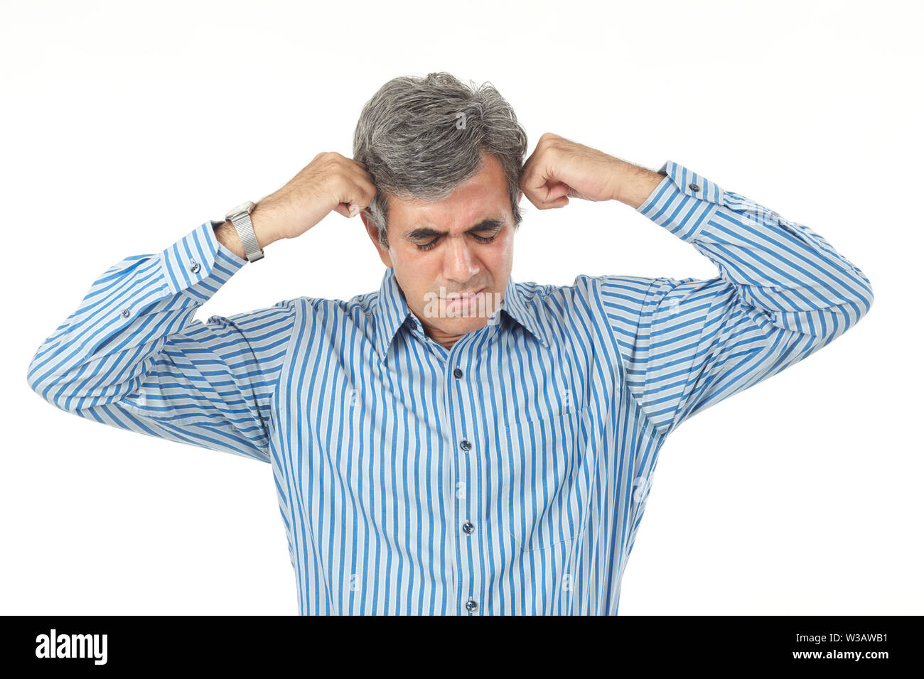 Businessman suffering from headache Stock Photo - Alamy