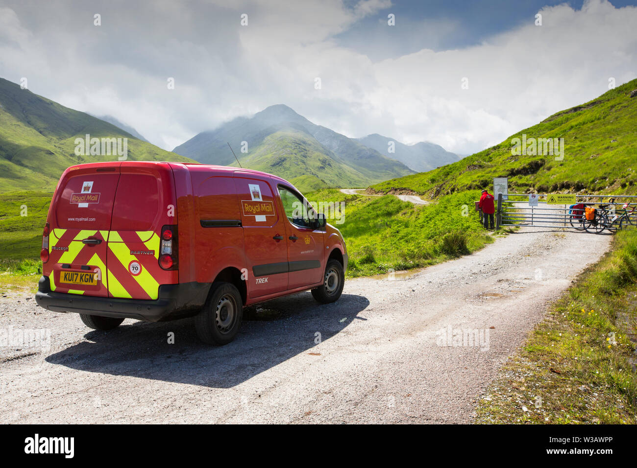 A post women delivering the mail to the remote Strathan at the head of ...