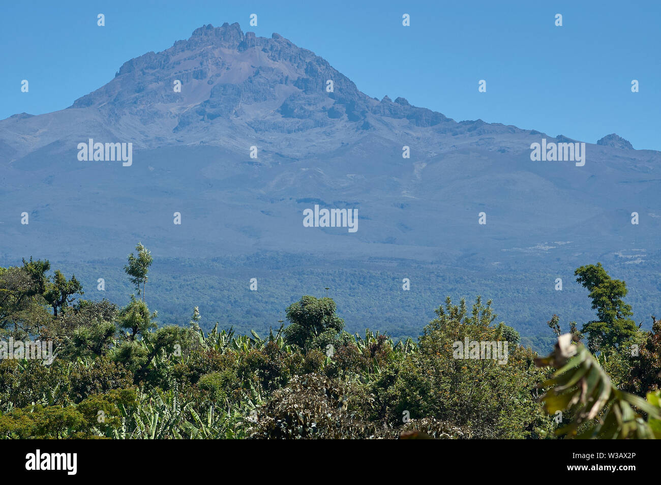 Mawenzi peak of Mt. Kilimanjaro as seen from Maua village Stock Photo ...