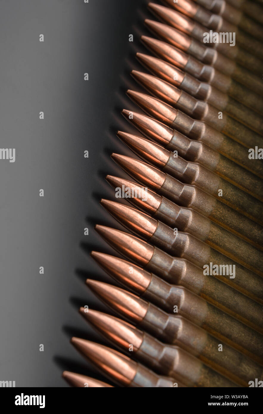 Rifle bullets close-up on black back. Cartridges for rifle and carbine ...