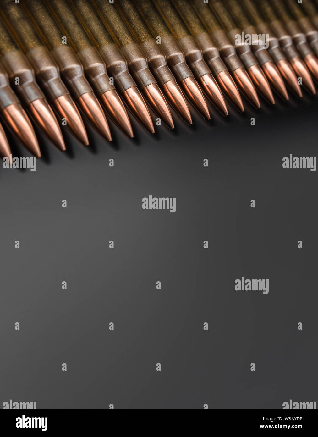 Rifle bullets close-up on black back. Cartridges for rifle and carbine ...