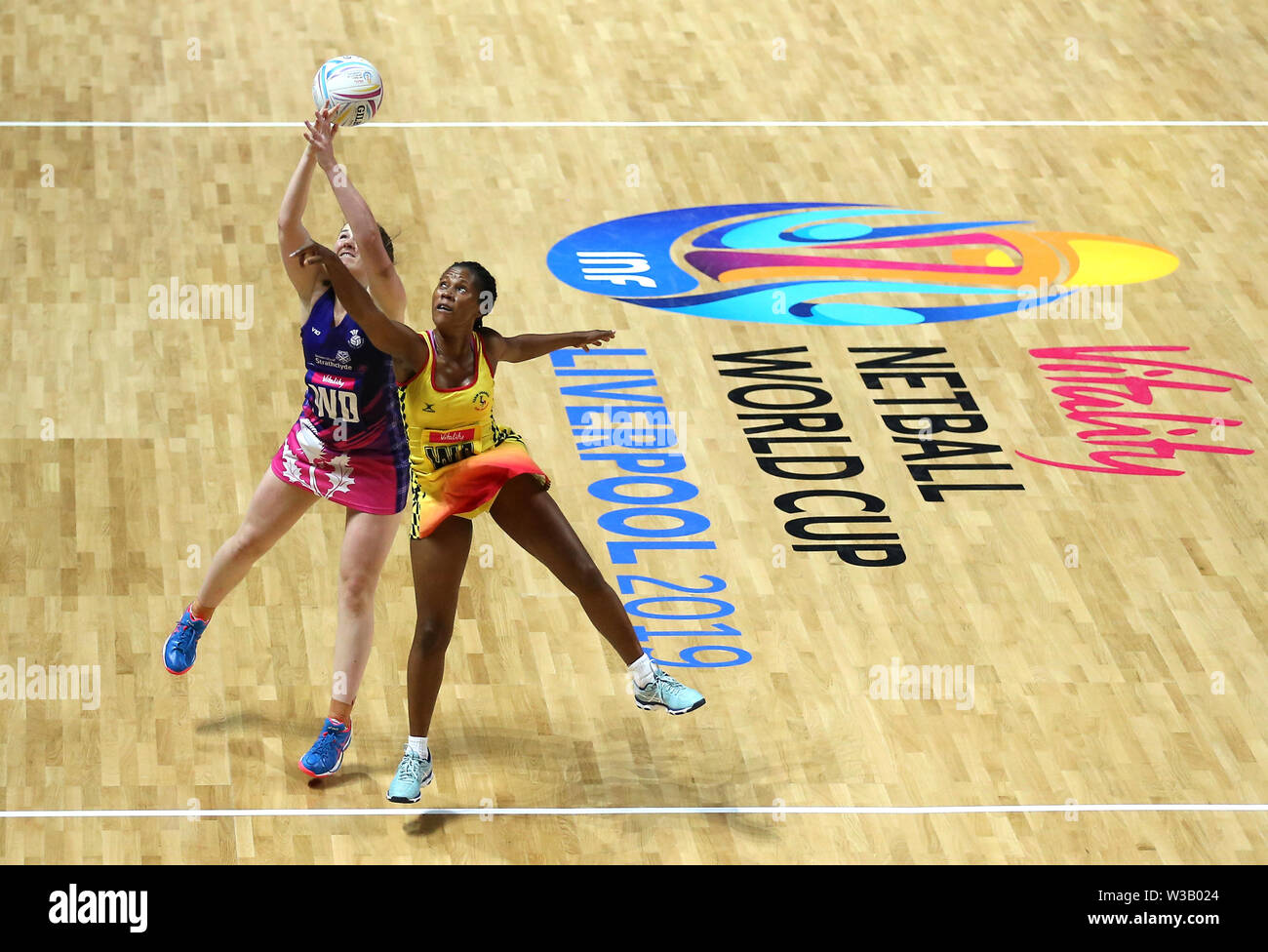 Uganda's Ruth Meeme (right) and Scotland's Kelly Boyle battle for the ...