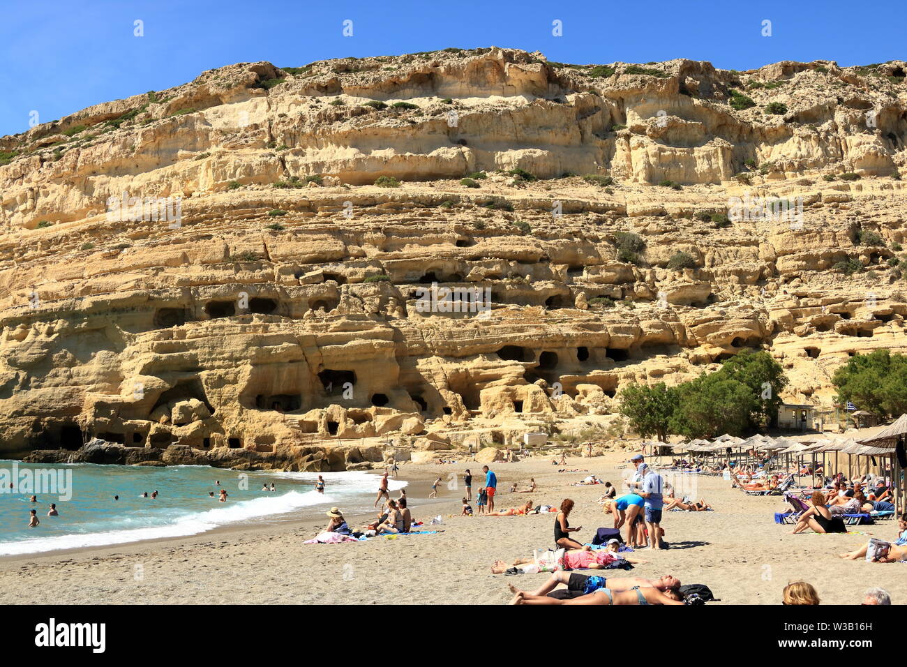 Matala beach with turquoise water, Crete in Greece Stock Photo - Alamy