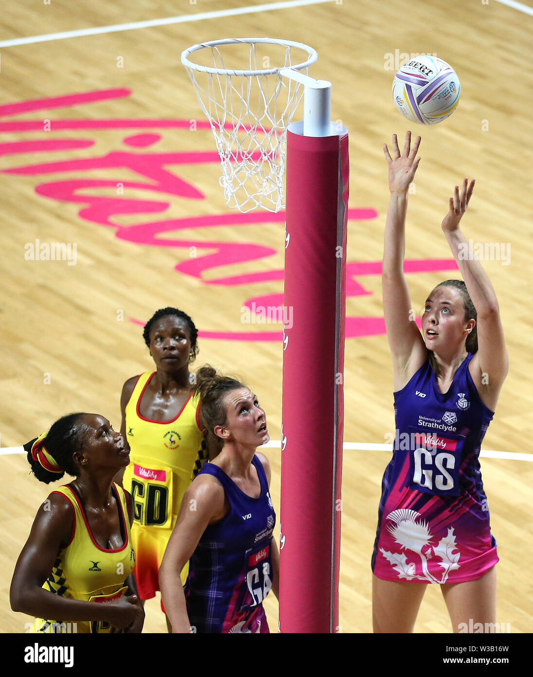 Scotland's Emma Barrie shoots against Uganda during the Netball World ...