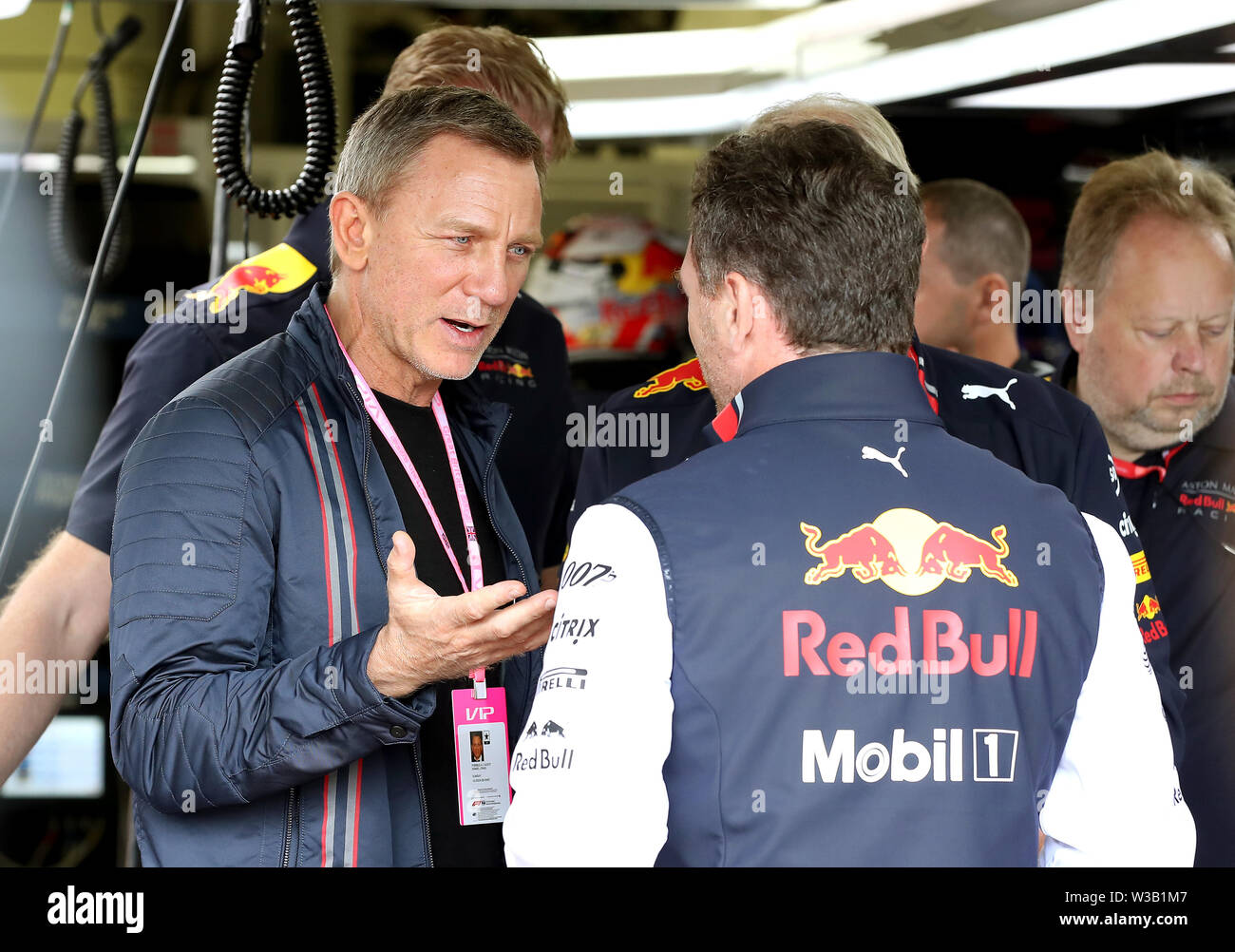 Daniel Craig (left) arrives during the British Grand Prix at ...