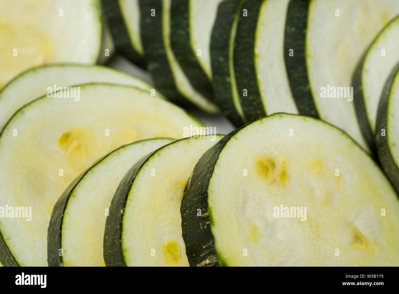 zucchini, courgette slices closeup Stock Photo - Alamy