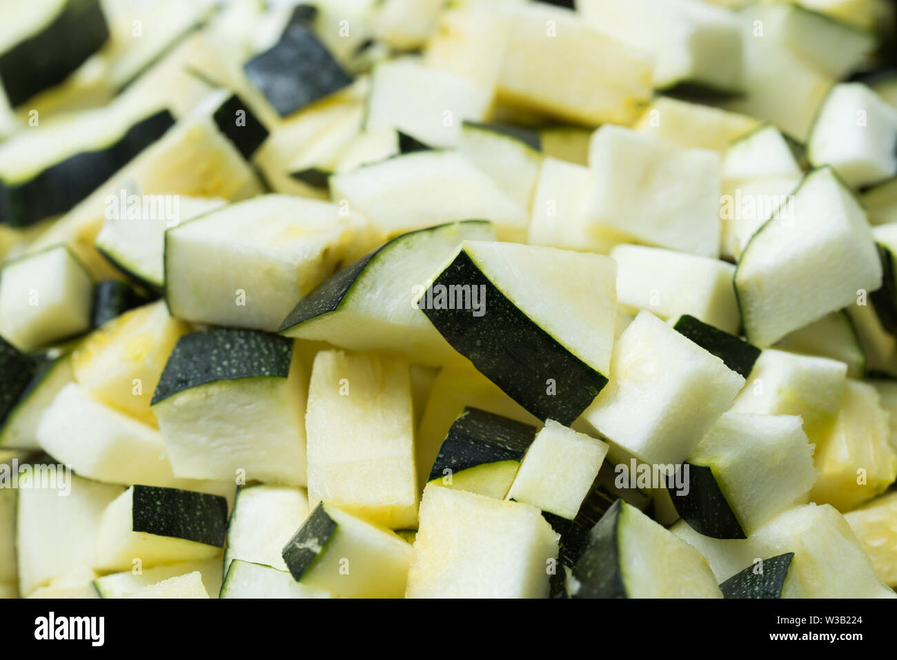 raw chopped zucchini, courgette closeup Stock Photo - Alamy
