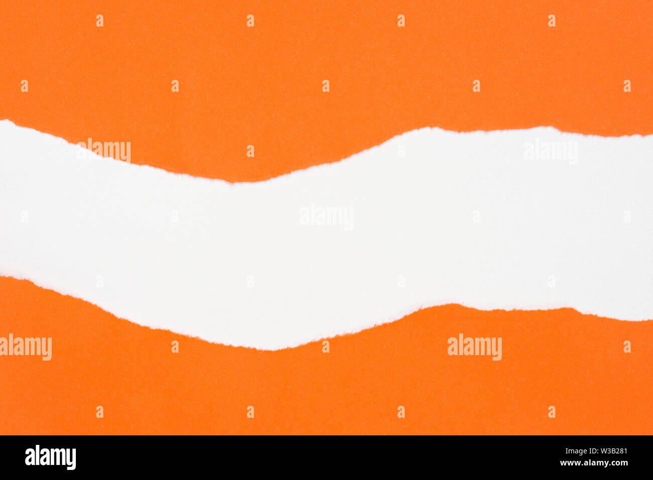 pieces of orange color paper on white background with copy space Stock ...