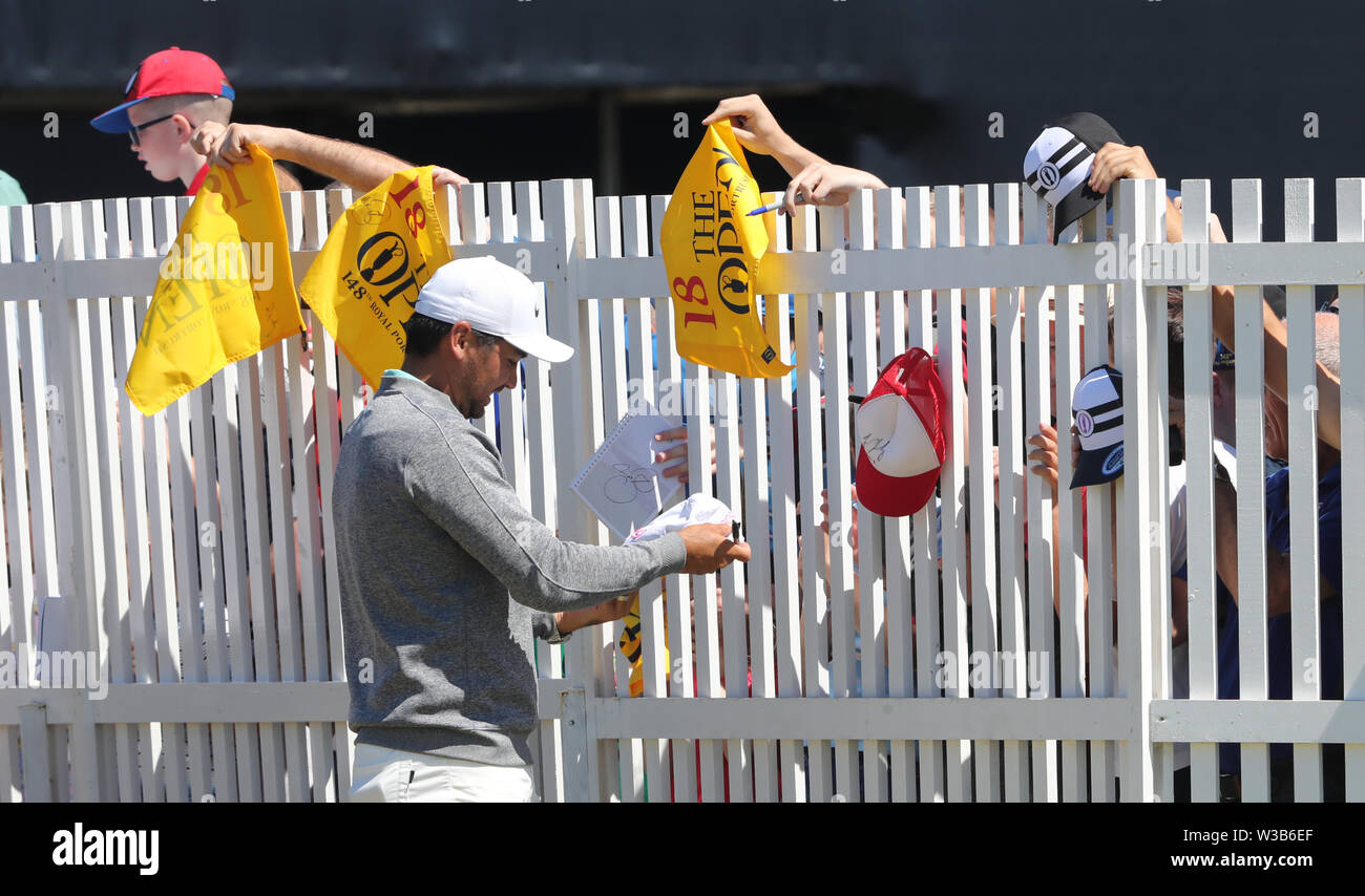 Jason Day signs autographs during preview day one of The Open ...