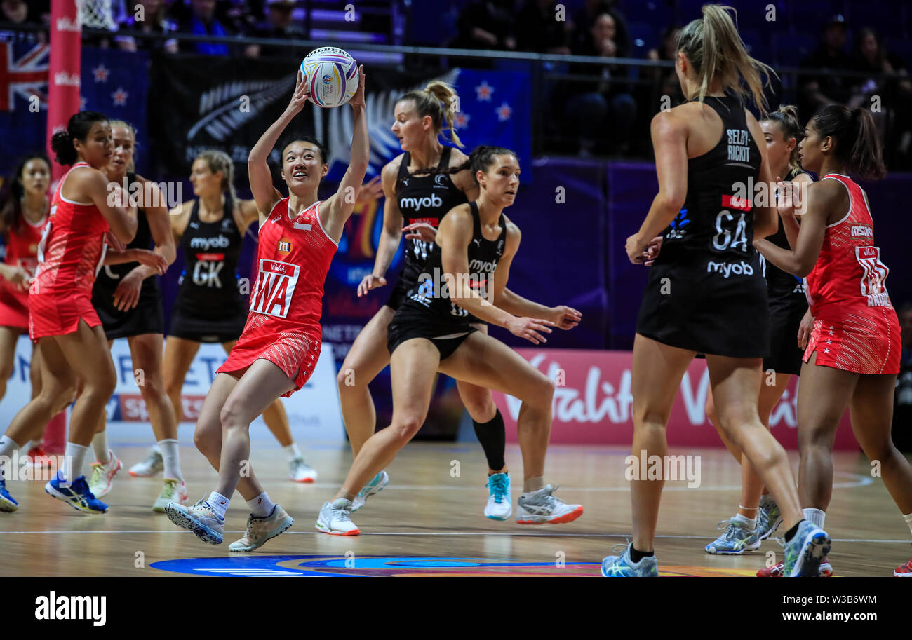 New Zealand v Singapore Carmen Goh receives the ball during the Netball ...