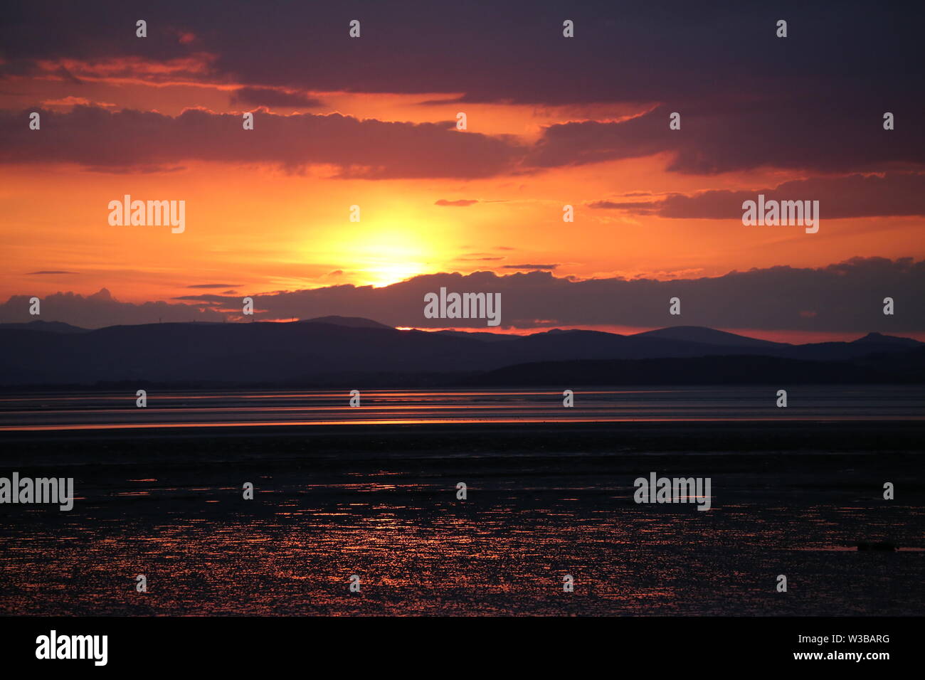 Morecambe Bay sunset sky Stock Photo - Alamy