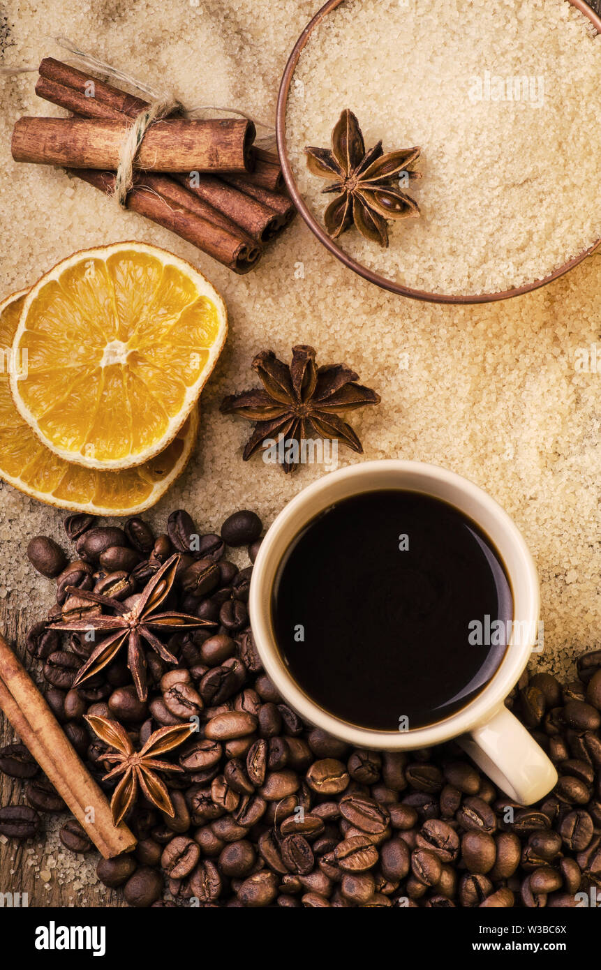 boiling black coffee in small cup, flavorings, brown sugar and coffee ...