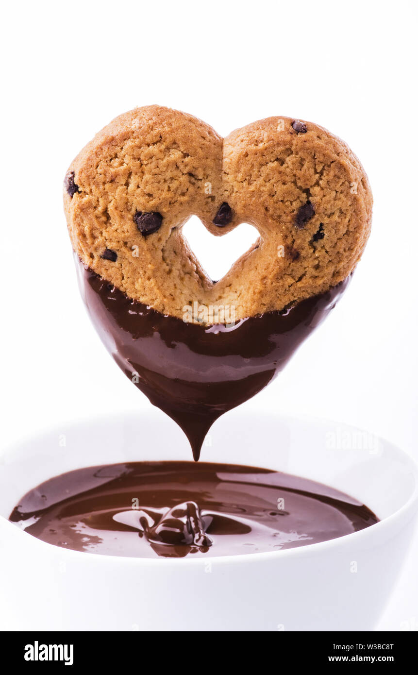 biscuit heart-shaped chocolate dipped in melted chocolate Stock Photo ...
