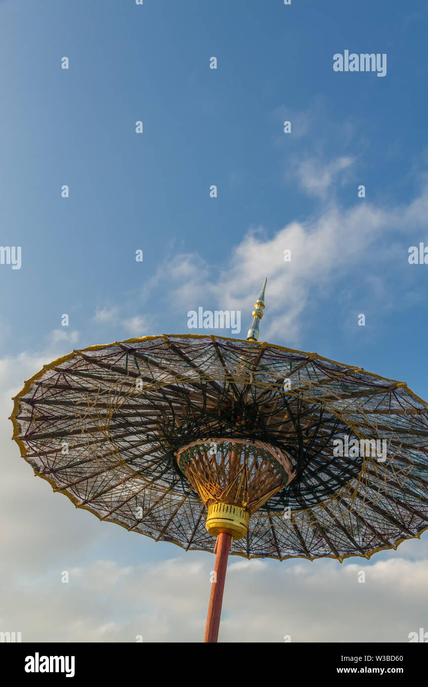 Religious Buddhist umbrella at the Kyaiktiyo Pagoda pilgrimage site ...